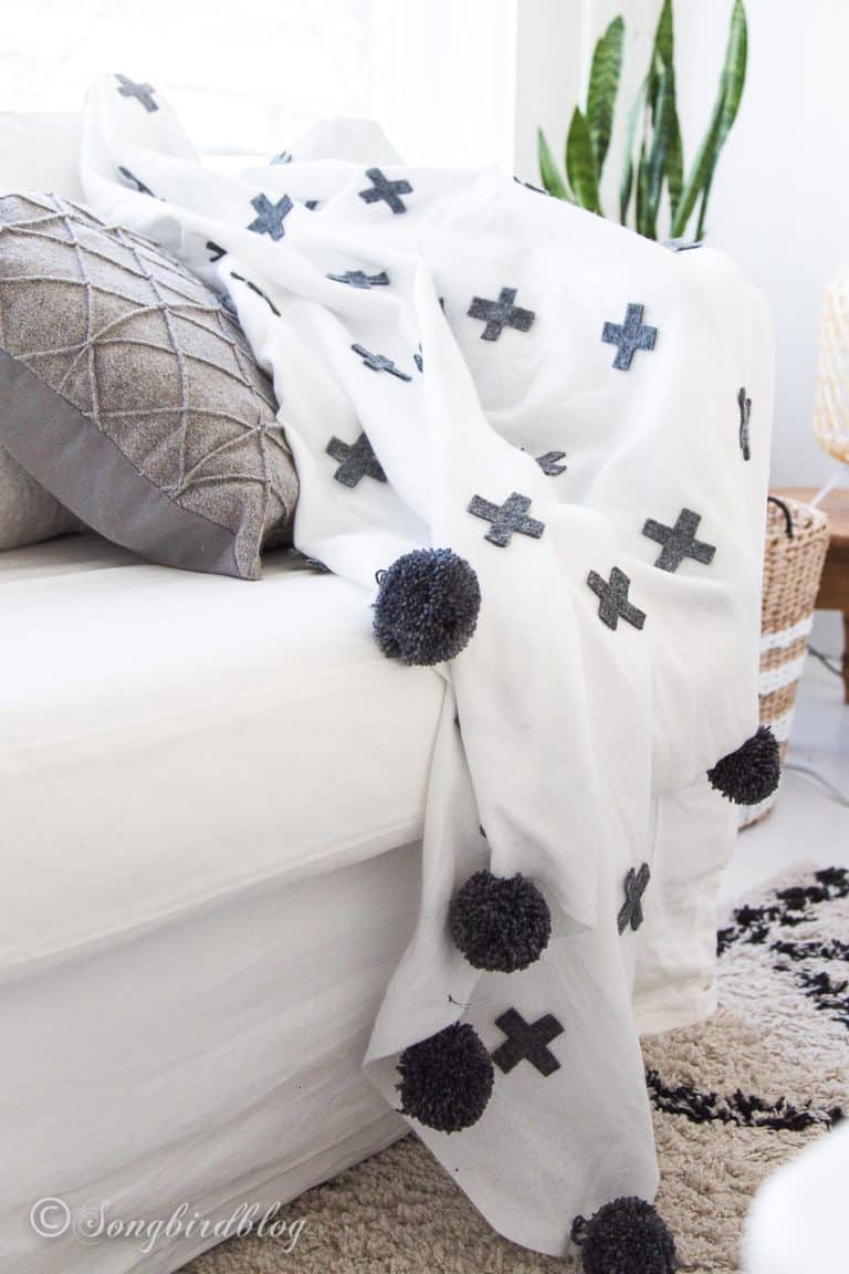 How to Make a DIY Fleece Blanket with Pom Poms - Songbird